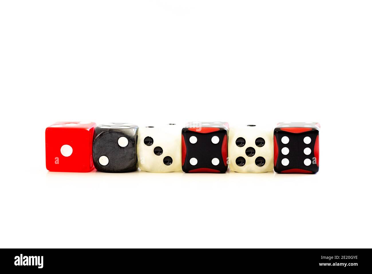 Six multi coloured dice isolated on white background with copy space ...