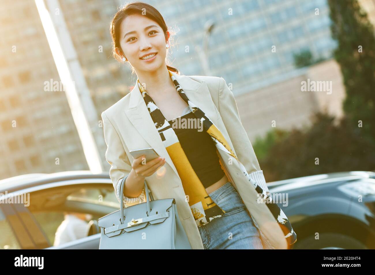 Chinese businesswoman walking out hi-res stock photography and images ...