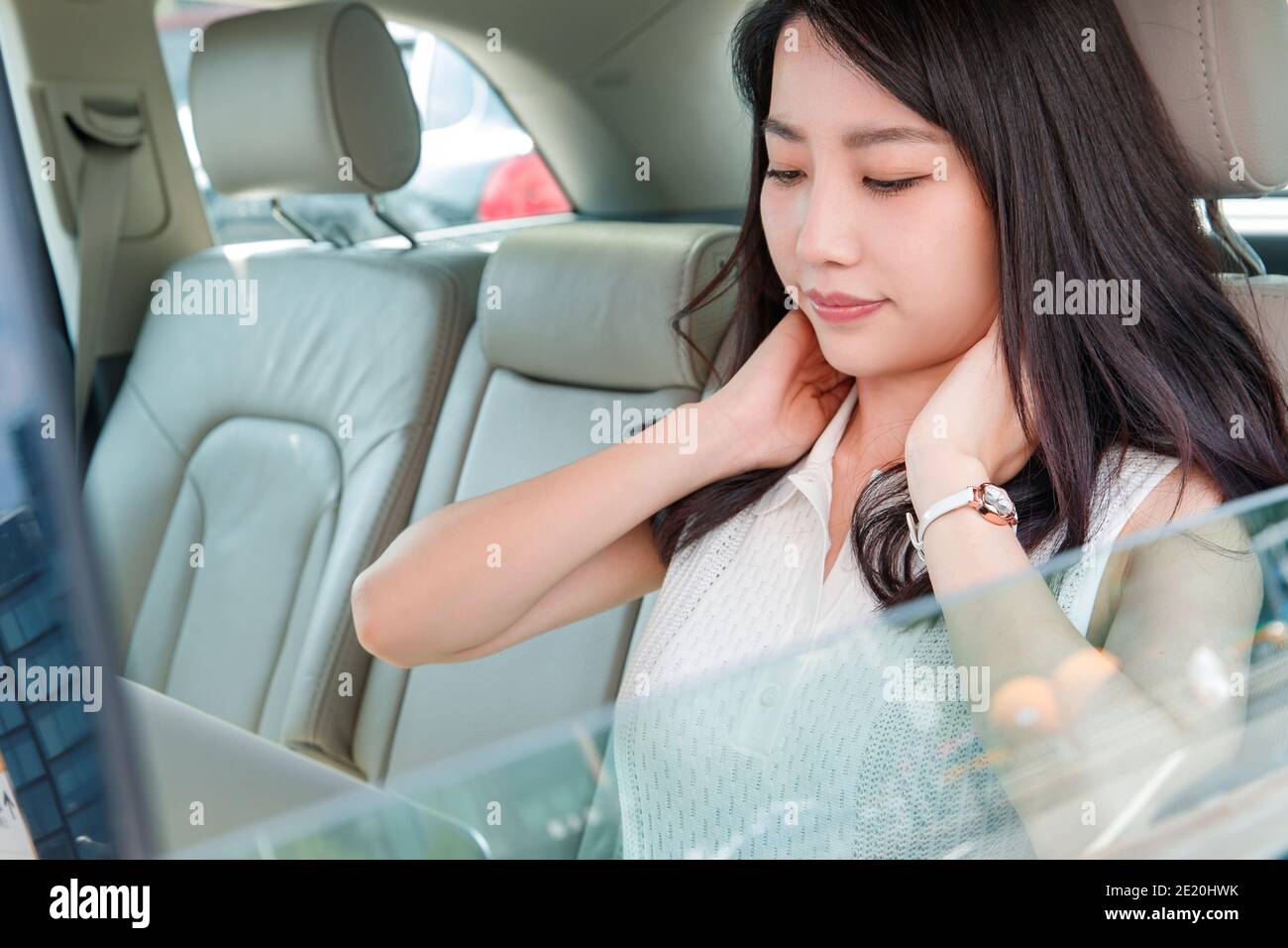 Inside the car tired business women Stock Photo - Alamy