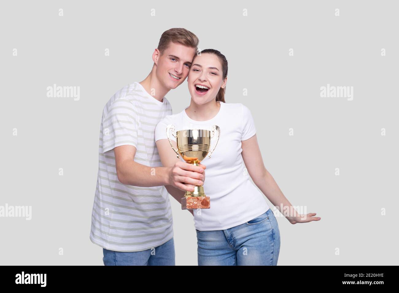 Couple Holding Trophy Happy Isolated. Couple Goals. Winners Stock Photo ...