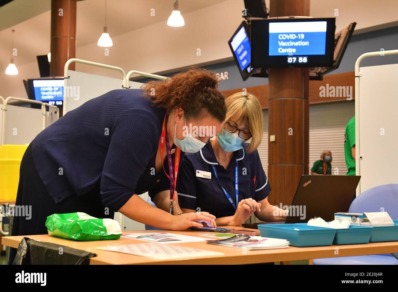 Staff make preparations ahead of the opening of the NHS mass ...