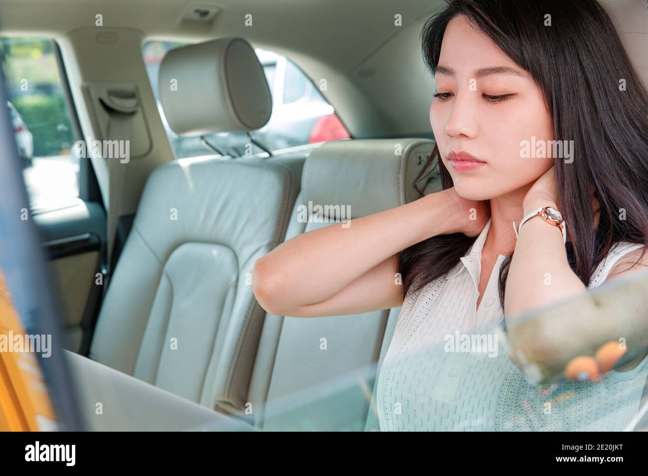Inside the car tired business women Stock Photo - Alamy