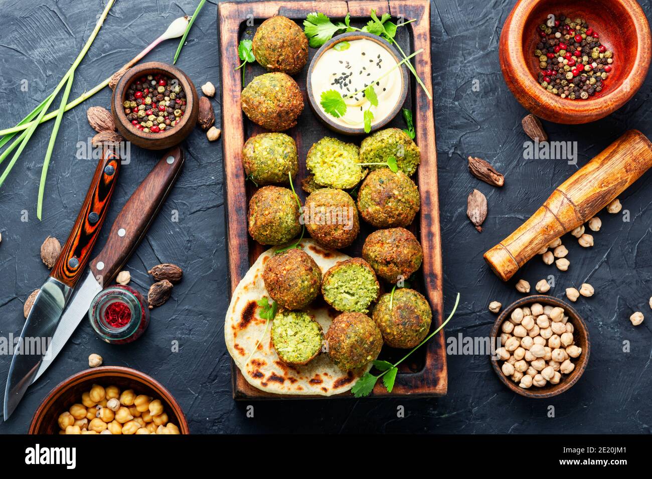 Falafel balls on a wooden cutting board.Arabic snack falafel Stock ...