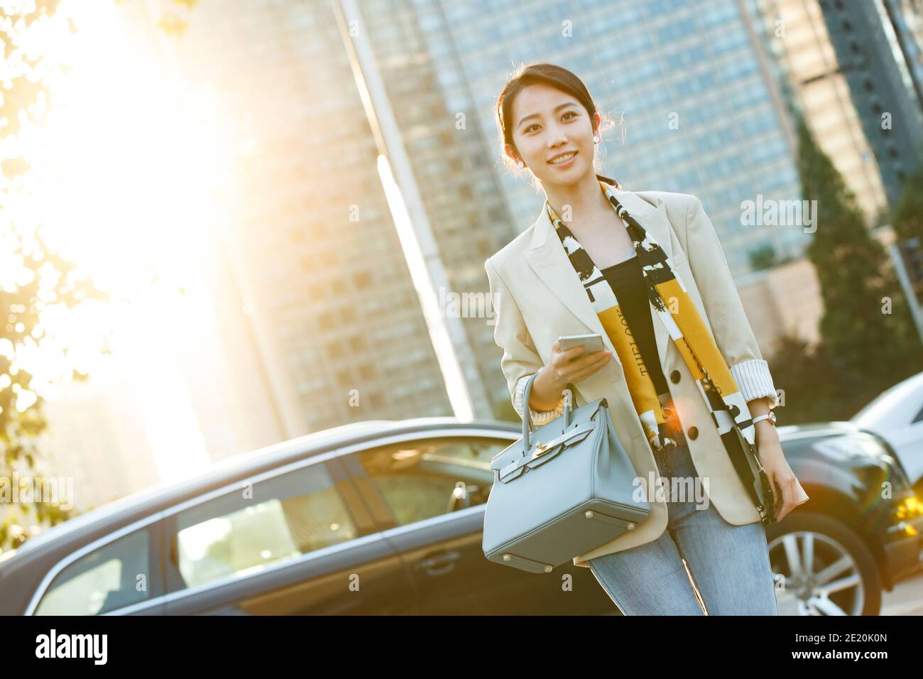Chinese businesswoman walking out hi-res stock photography and images ...