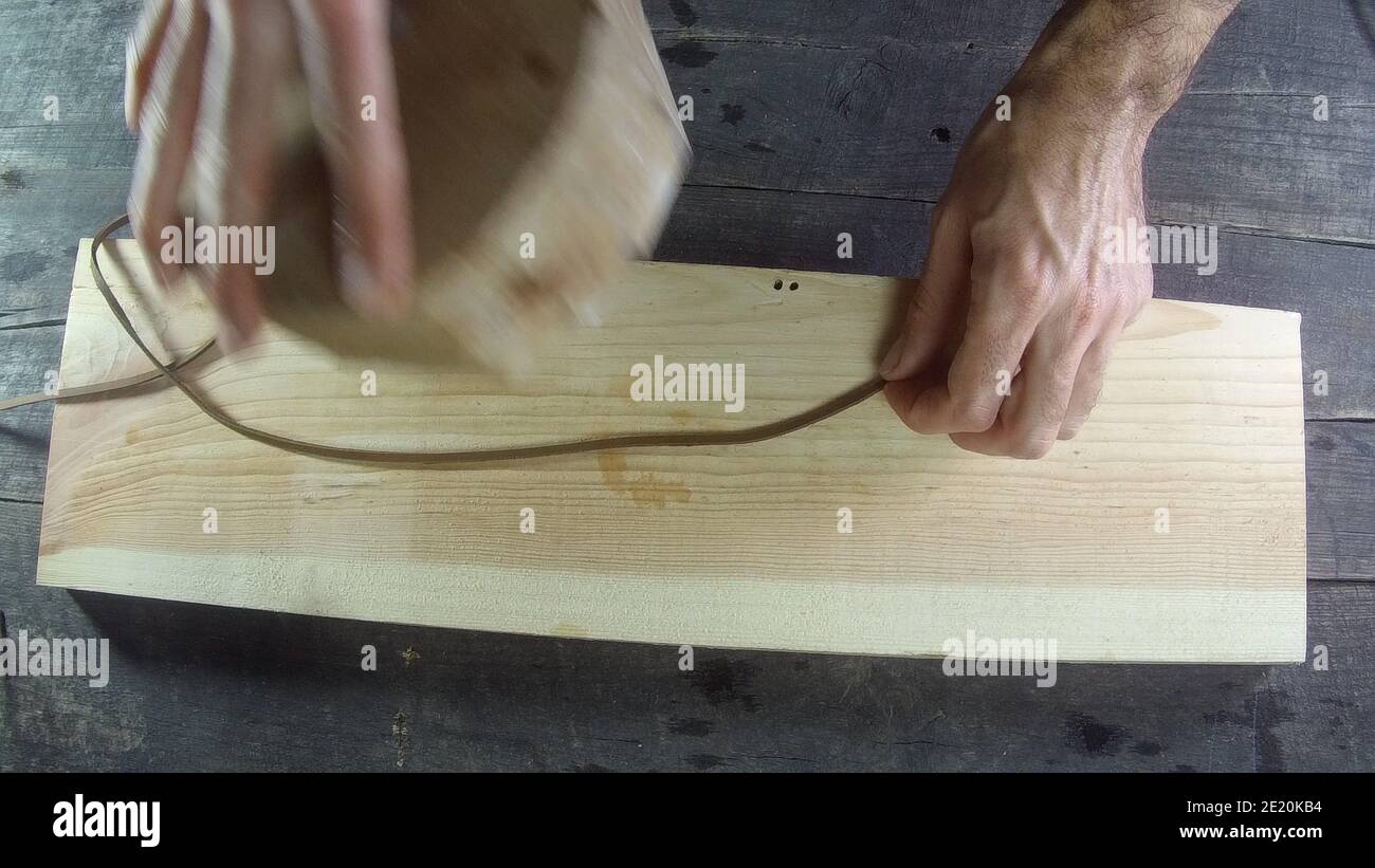 Leather lace making process hand hi-res stock photography and images ...