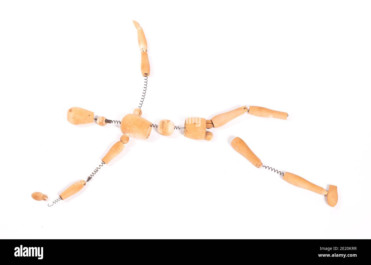 Broken wooden figurine, torn apart - Isolated on white Stock Photo - Alamy