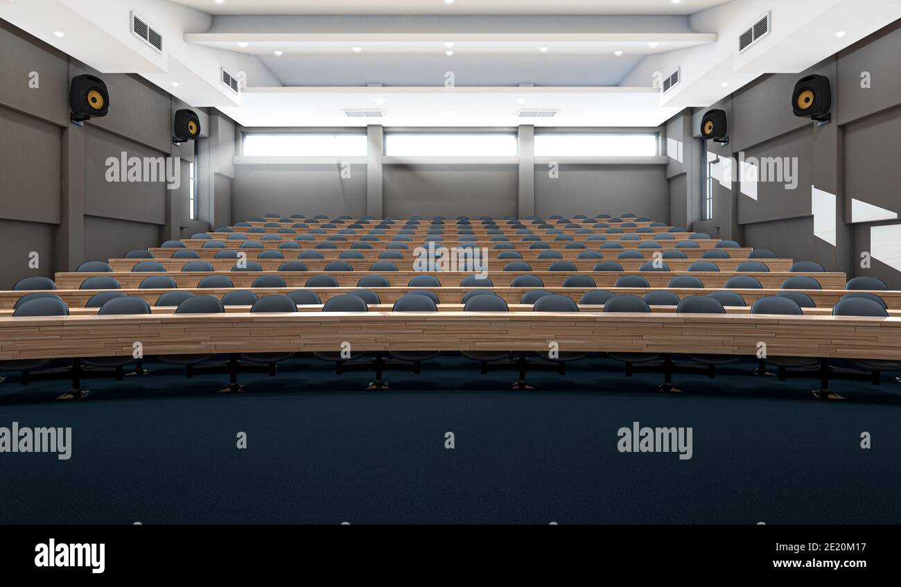 An interior of an empty lecture hall auditorium with rows of curved ...