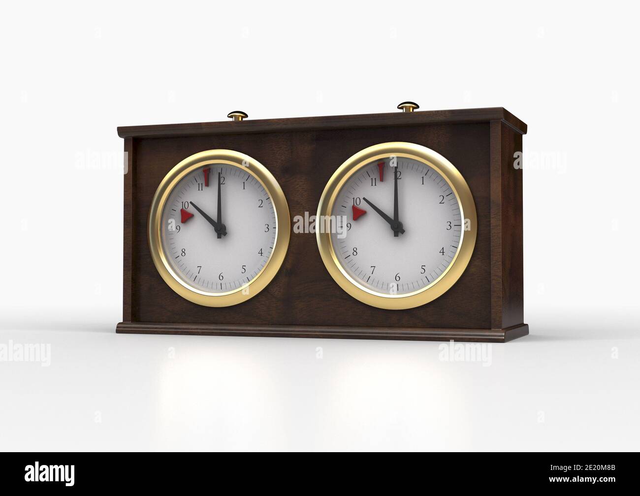 A classic wooden analog chess clock with brass trimmings on an isolated ...