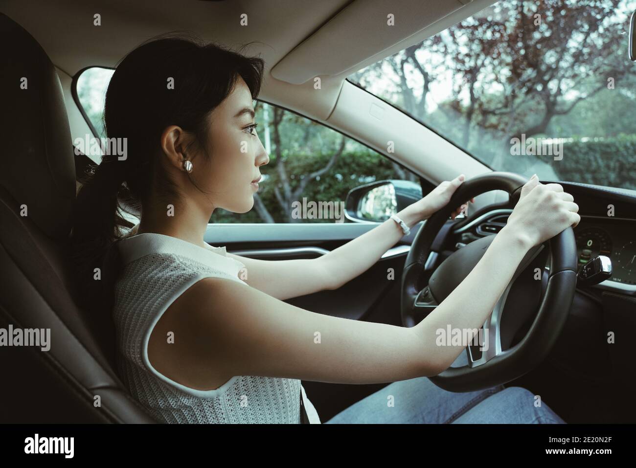 Drive young woman Stock Photo - Alamy