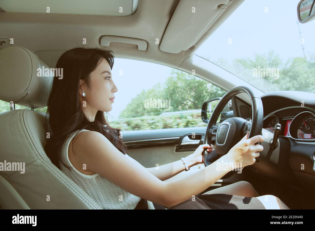 Women driving the car city hi-res stock photography and images - Alamy