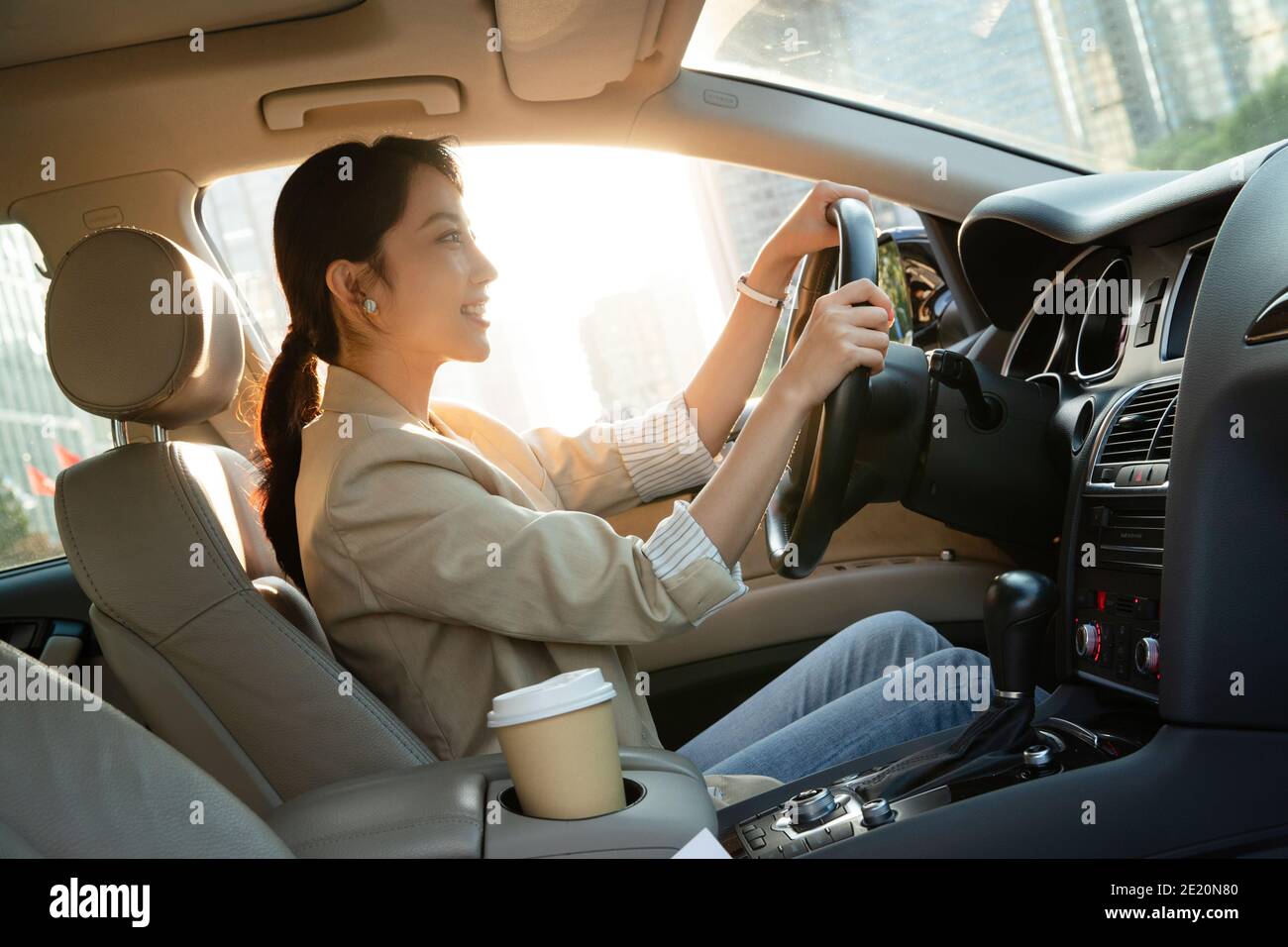 Drive the beautiful young woman Stock Photo - Alamy