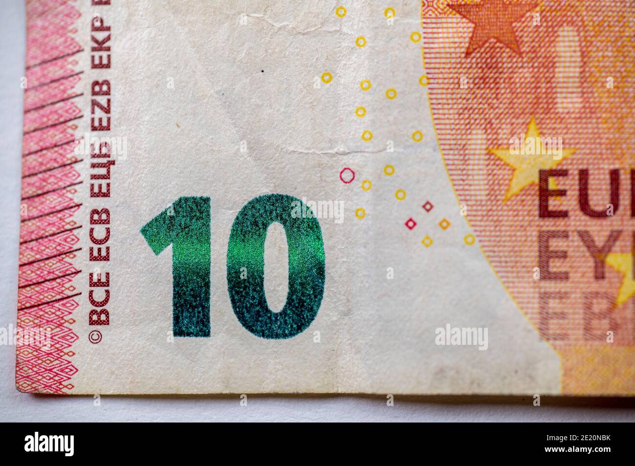 the 10 euro banknote detail on a white background Stock Photo - Alamy
