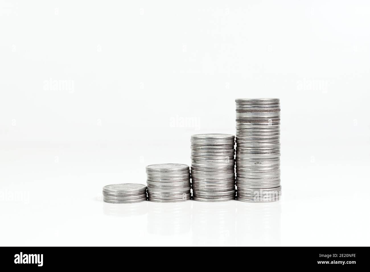 Columns of coins on a light background. Metallic currency. Money Stock ...