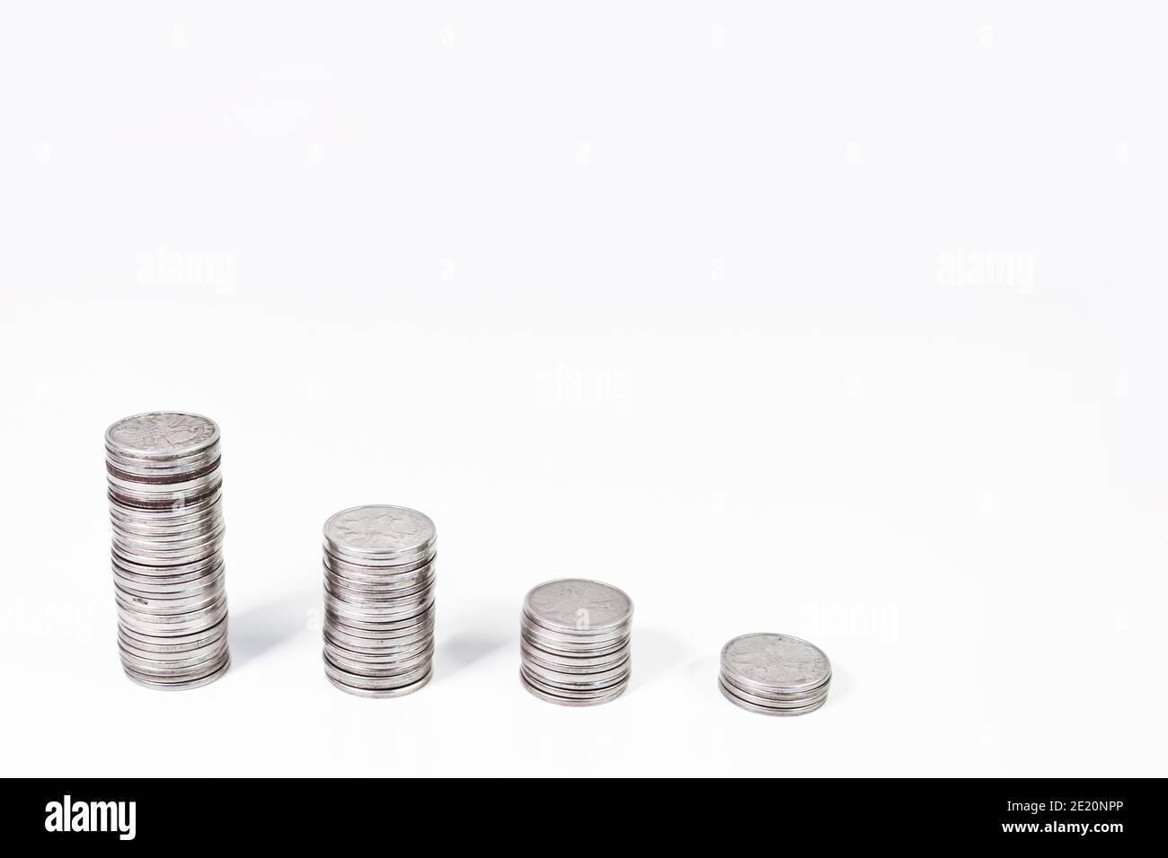 Columns of coins on a light background. Metallic currency. Money Stock ...