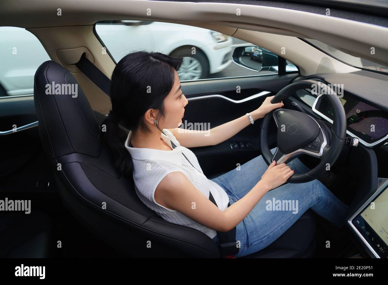 Drive young woman Stock Photo - Alamy