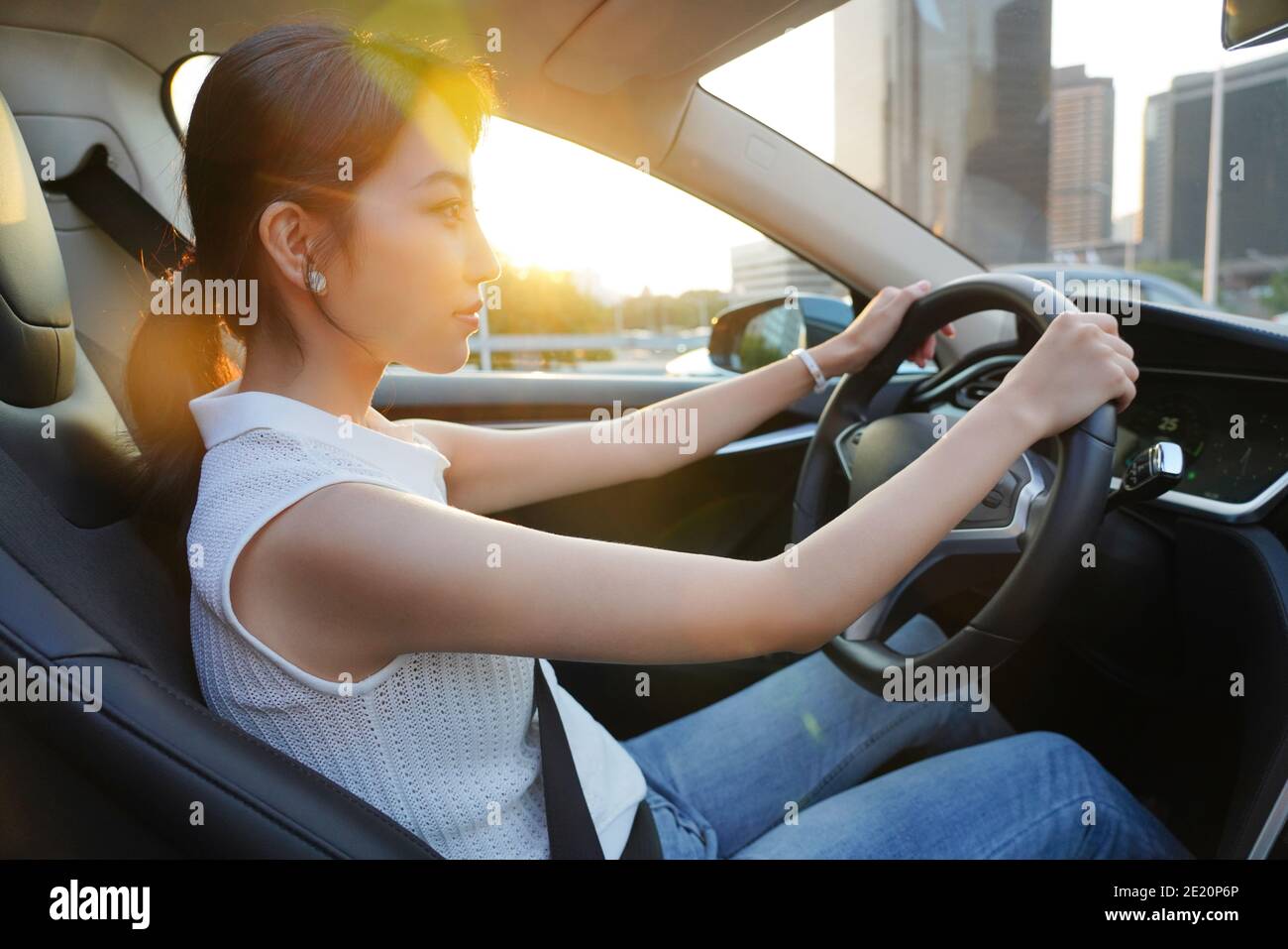 Drive young woman Stock Photo - Alamy
