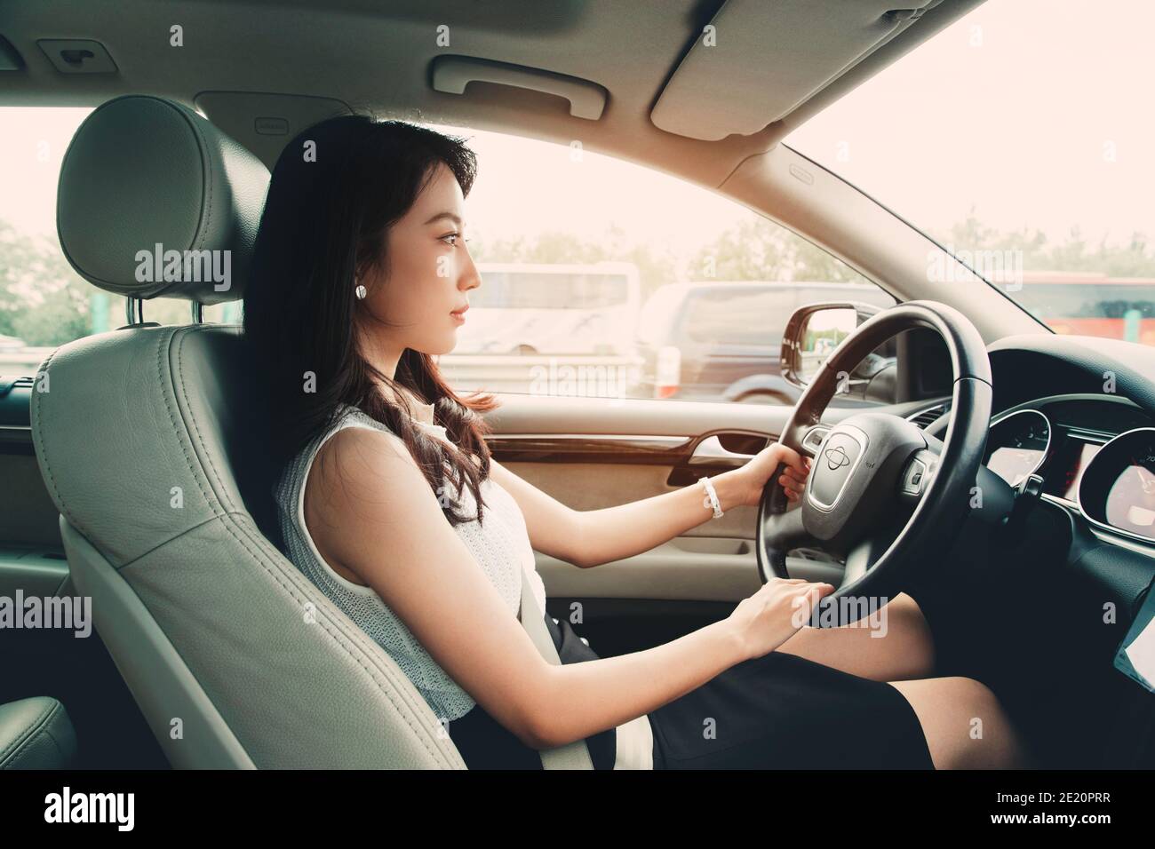 Confident young women to drive Stock Photo - Alamy