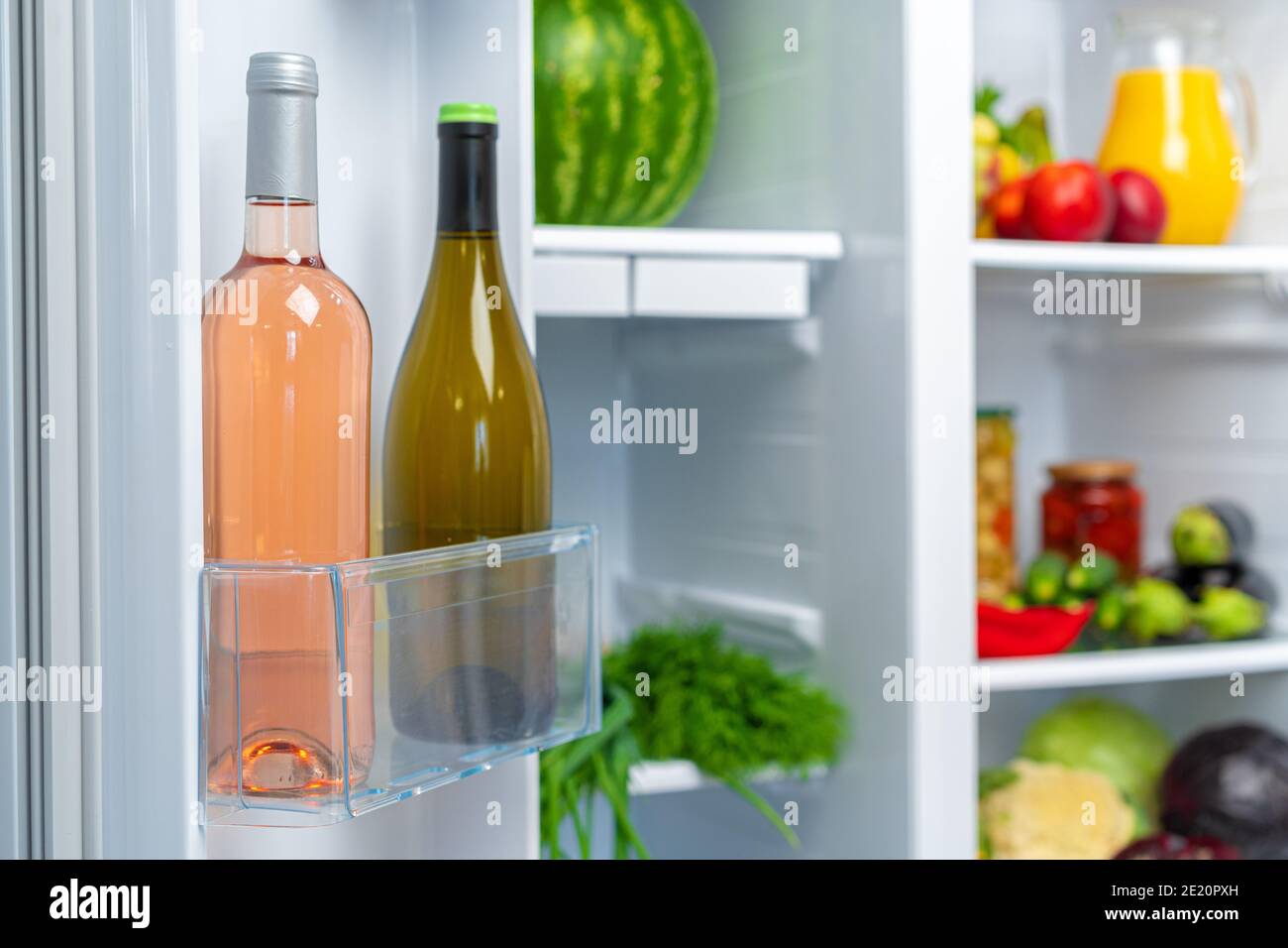 Open fridge full of fresh food and drinks Stock Photo - Alamy