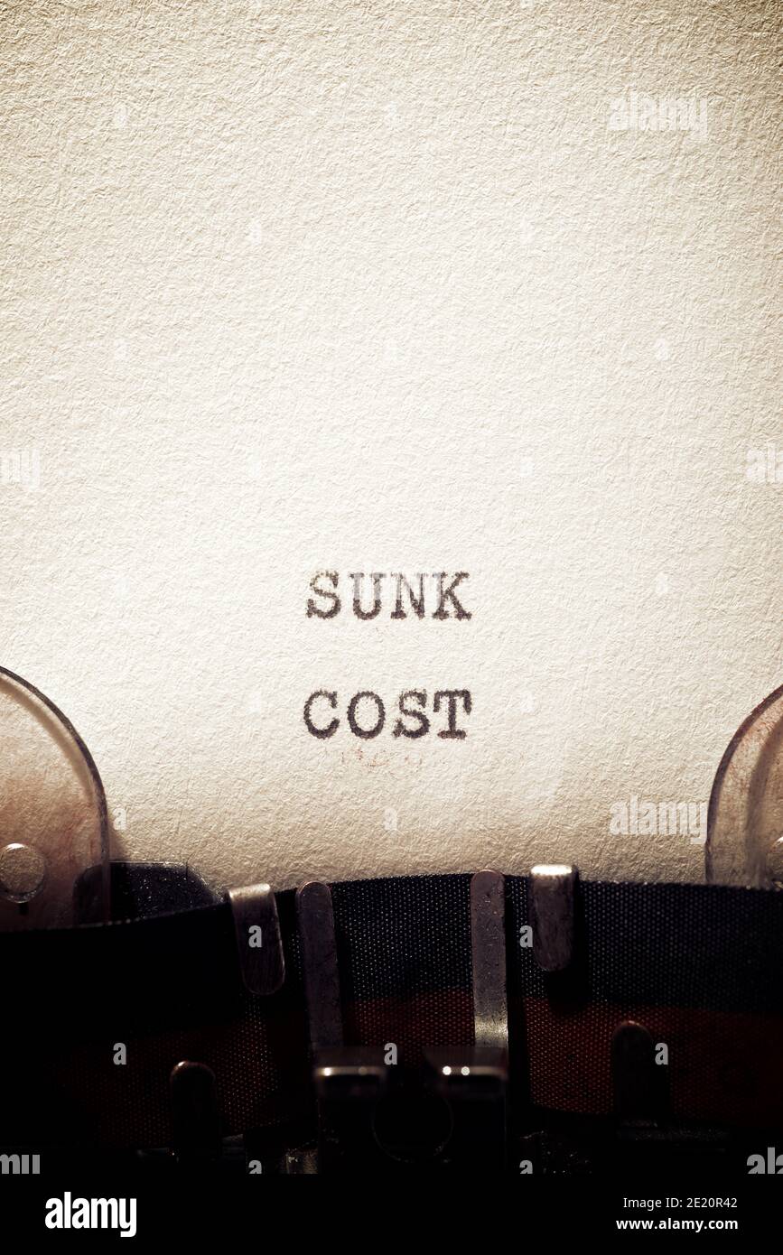 Sunk cost word hi-res stock photography and images - Alamy