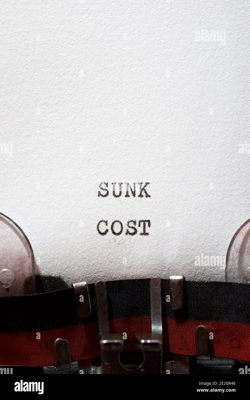 Sunk cost word hi-res stock photography and images - Alamy