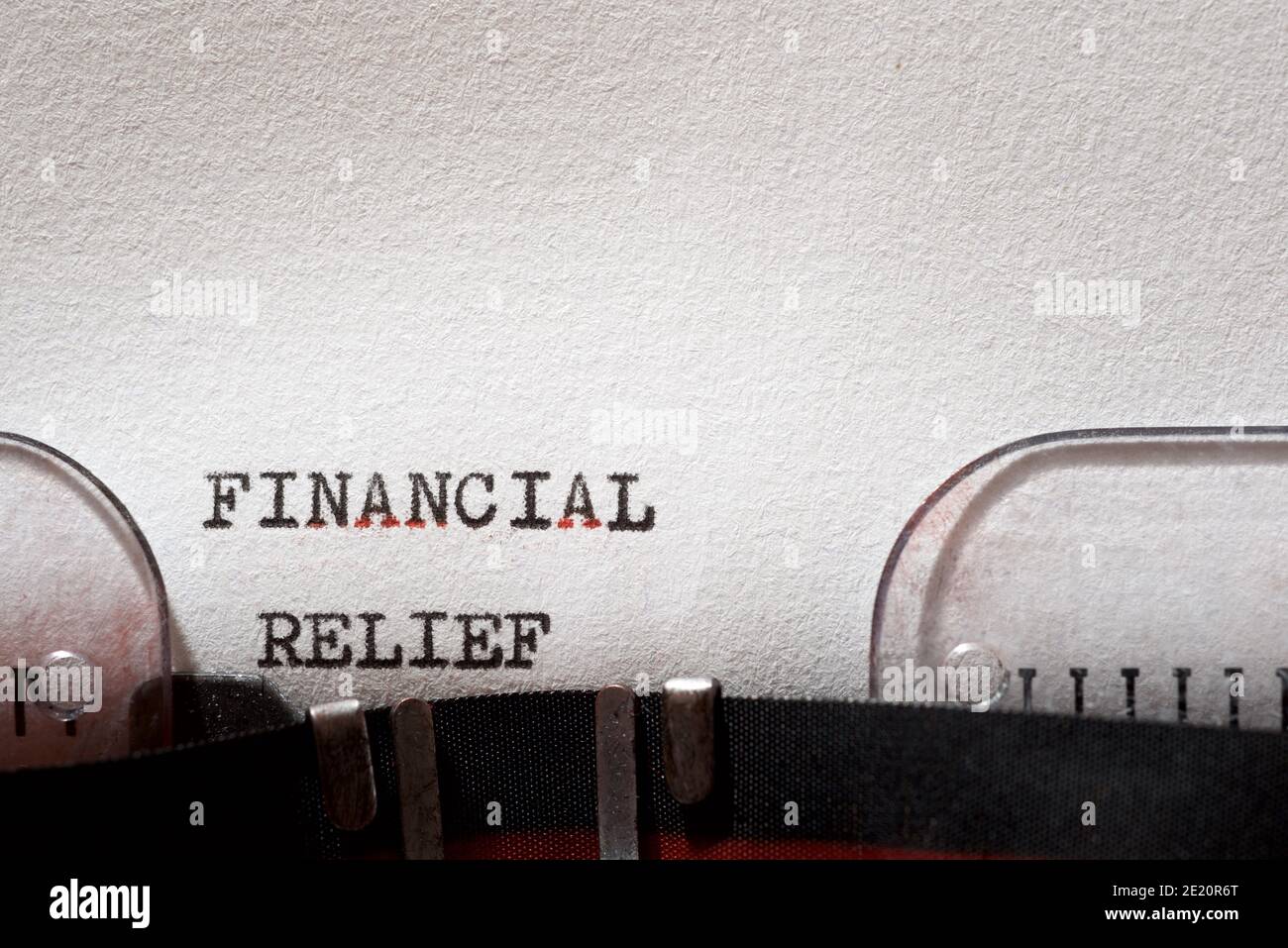 Financial relief phrase written with a typewriter Stock Photo - Alamy