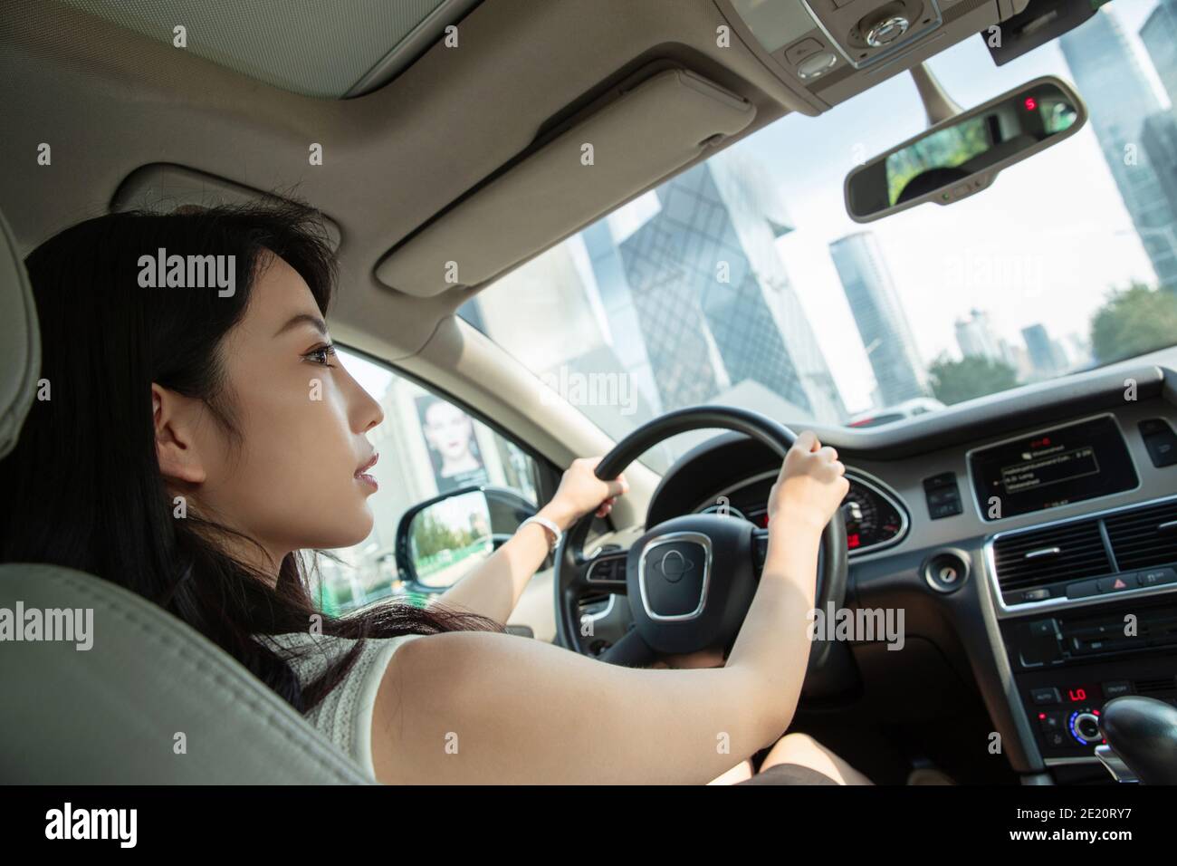 The young woman driving a car Stock Photo - Alamy