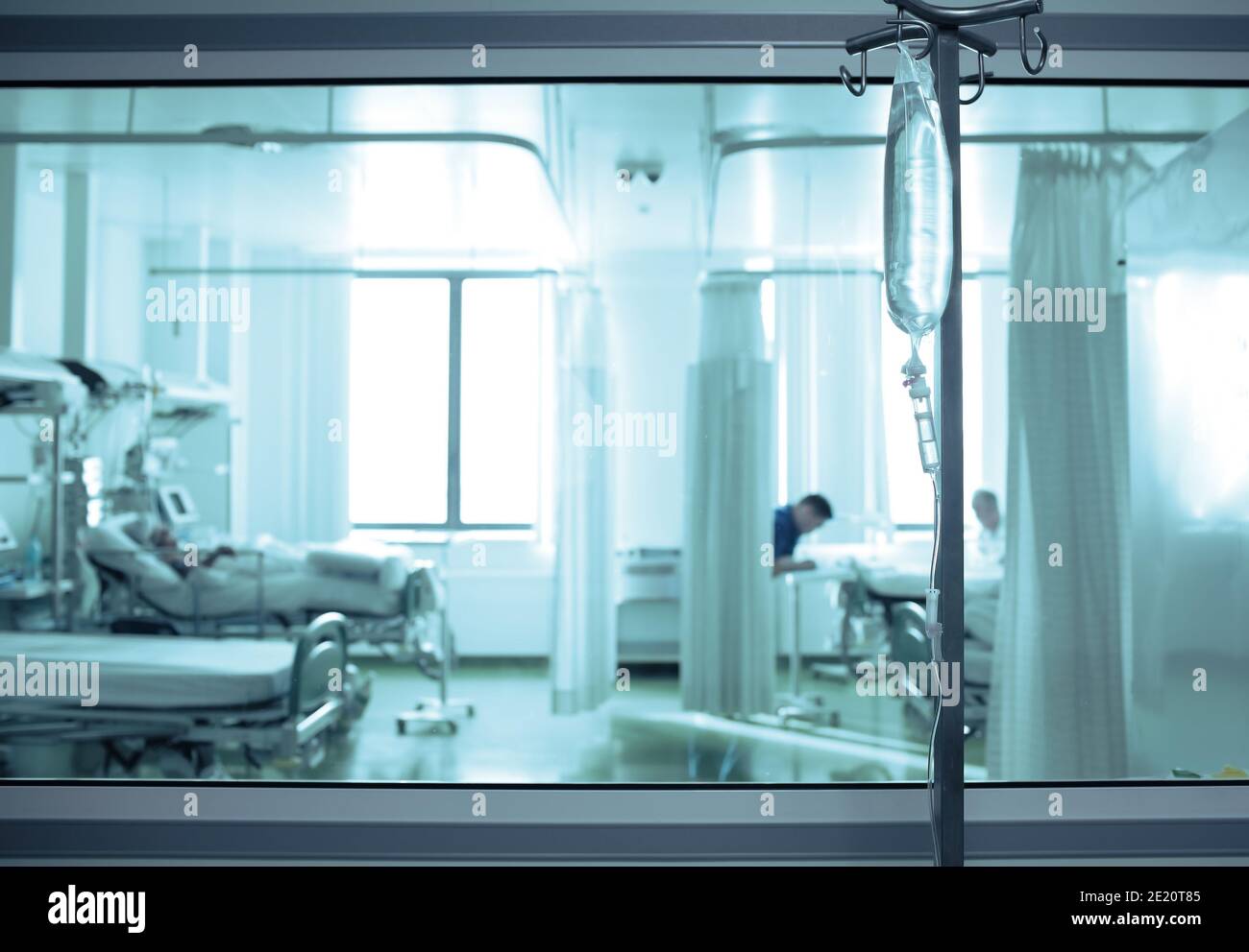 Intensive care unit ward behind the window glass Stock Photo - Alamy