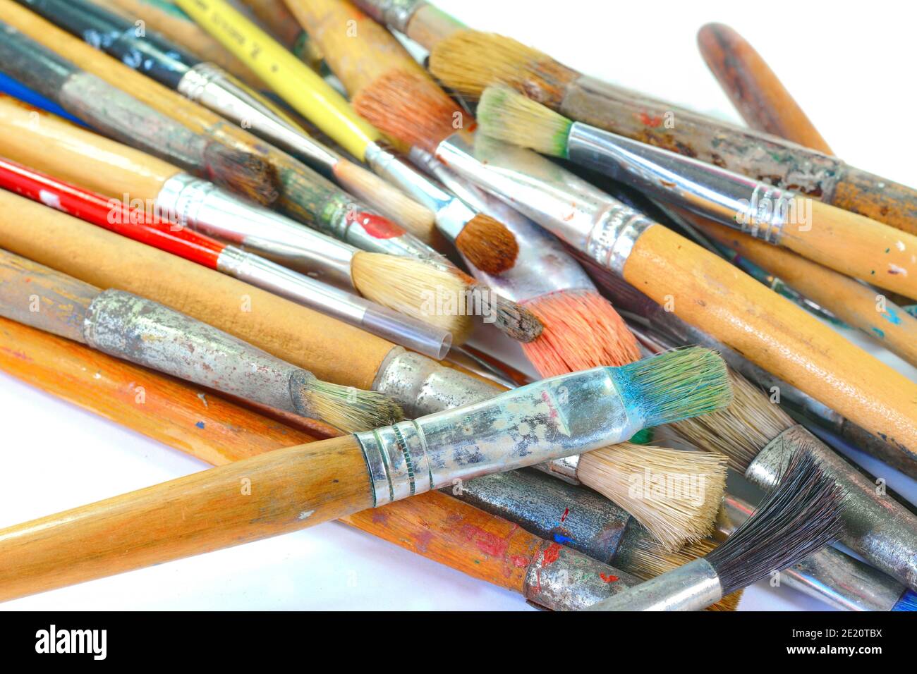 Various dirty paint brushes. Paints and brushes isolated on white background Stock Photo - Alamy