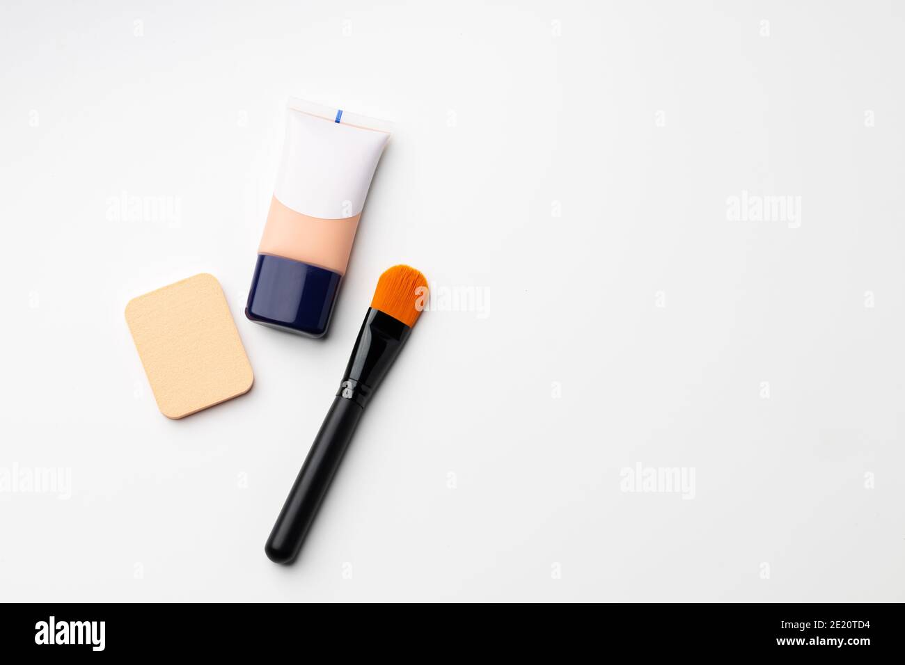 Make up liquid foundation with brush on white background Stock Photo ...