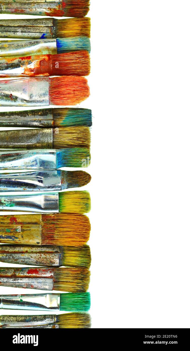 Various dirty paint brushes. Paints and brushes isolated on white ...