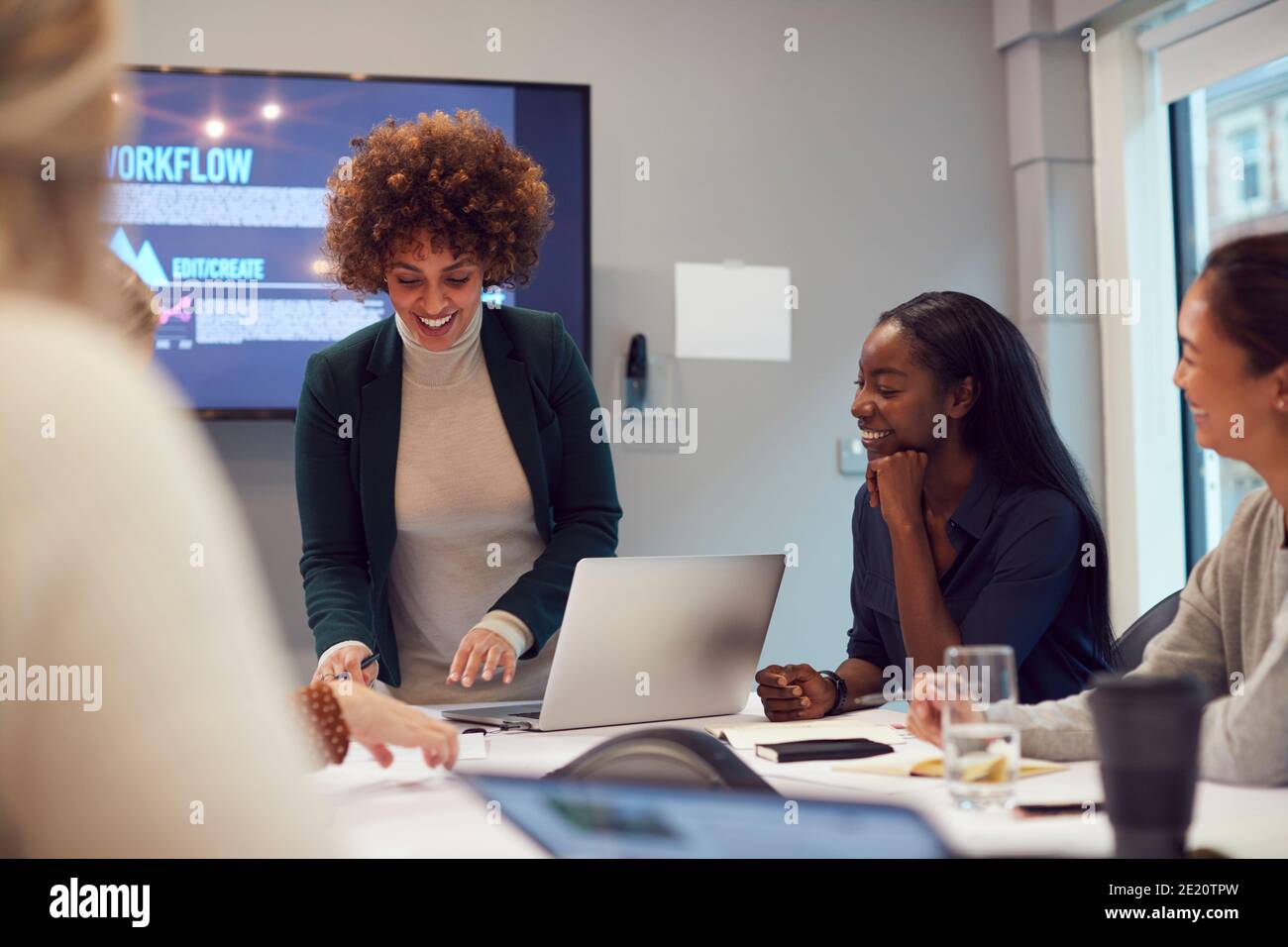 Pregnant Businesswoman Leads Creative Meeting Of Women Collaborating ...