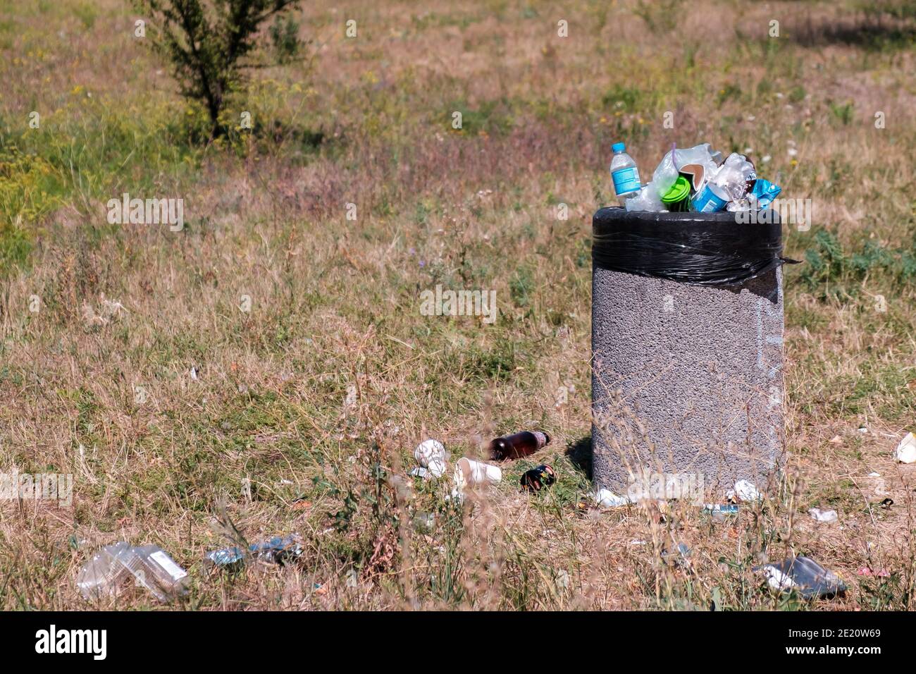 Garbage can overflowing plastic bottles hi-res stock photography and ...