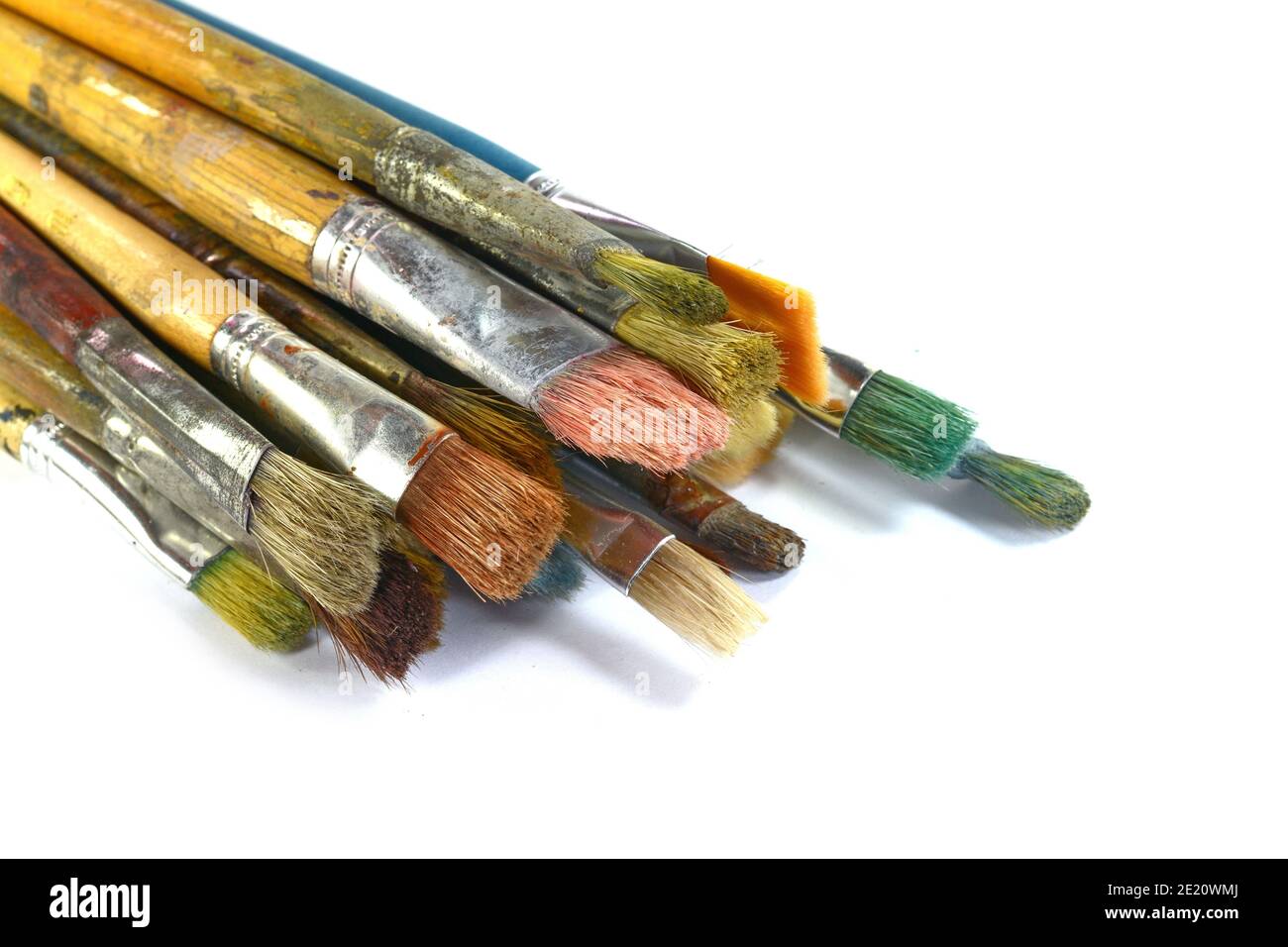 Various dirty paint brushes. Paints and brushes isolated on white background Stock Photo - Alamy
