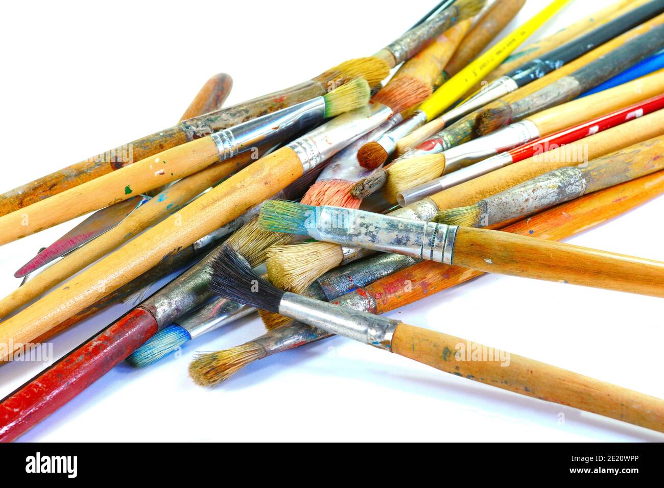 Various dirty paint brushes. Paints and brushes isolated on white ...