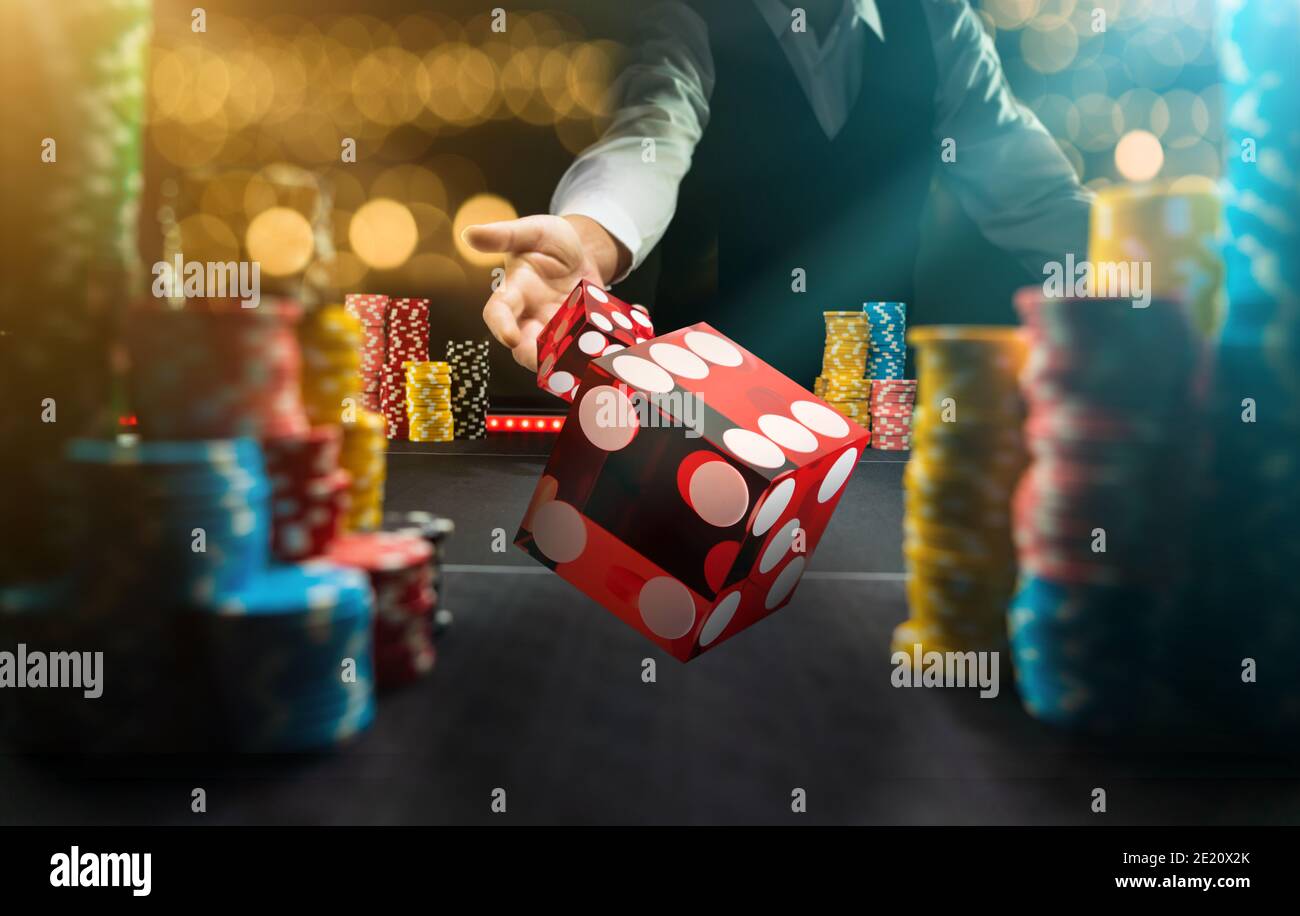 Man gambling at the craps table at the casino - Selective focus Stock ...