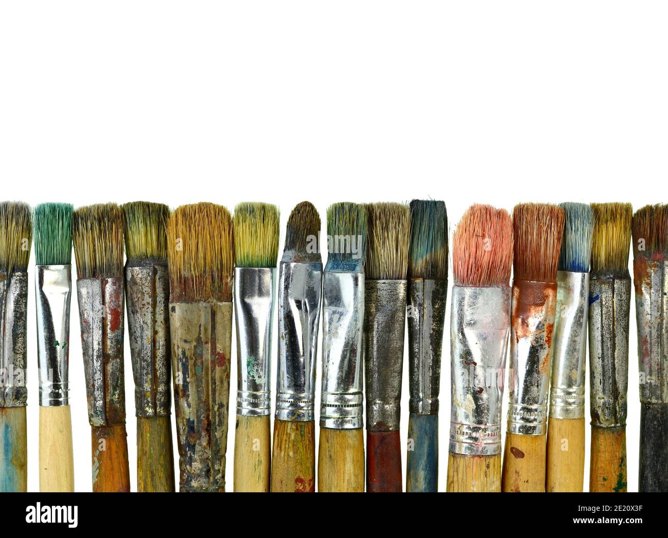 Various dirty paint brushes. Paints and brushes isolated on white ...