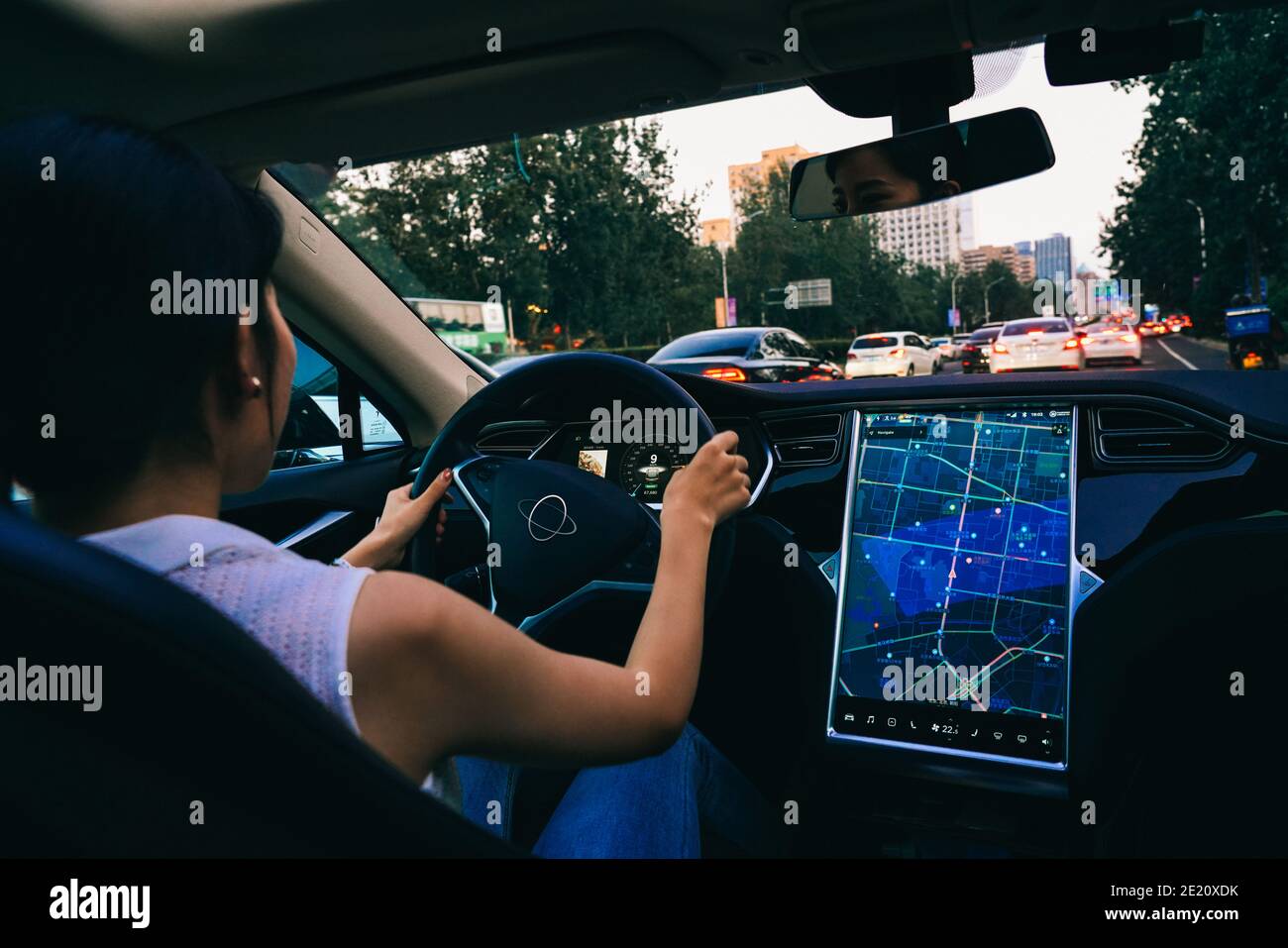 Traffic jam young woman driving a car Stock Photo - Alamy