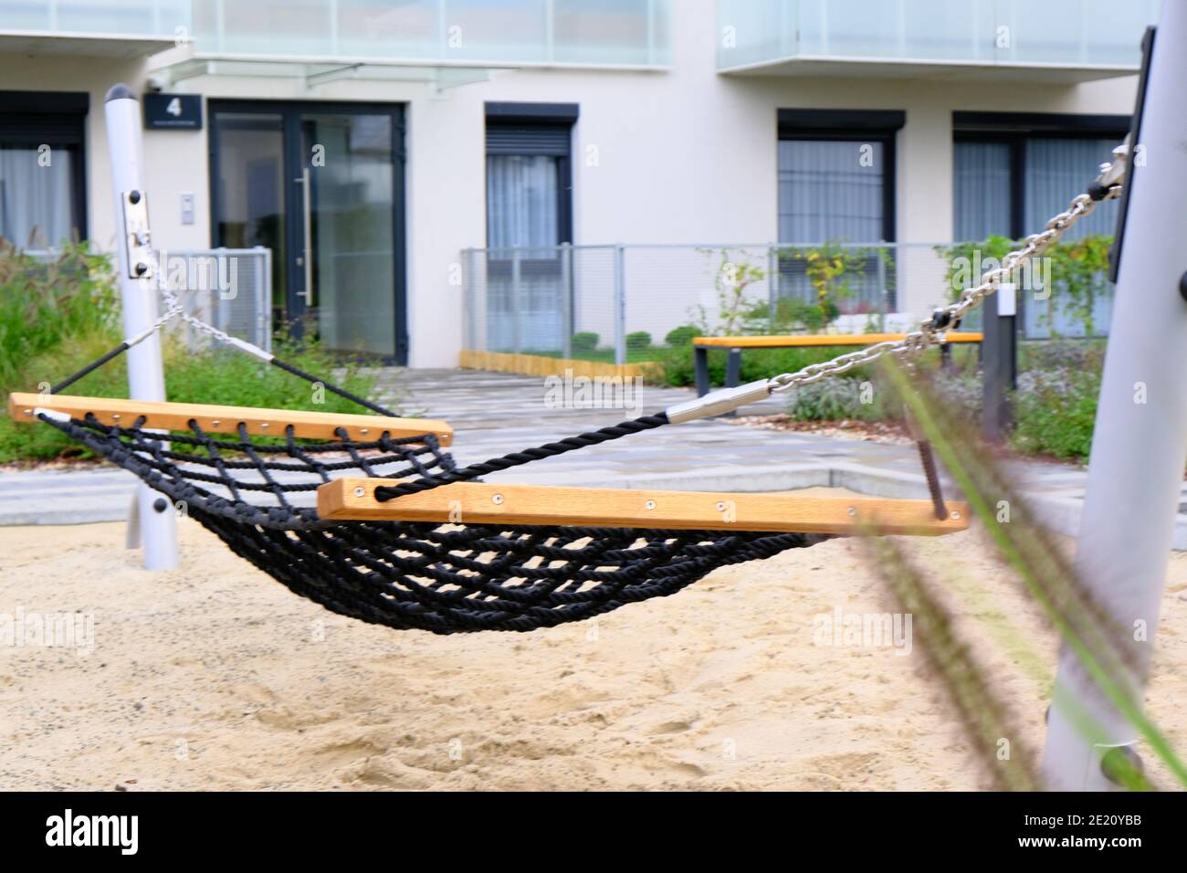 Hammock close-up on a playground in a cozy courtyard of modern ...