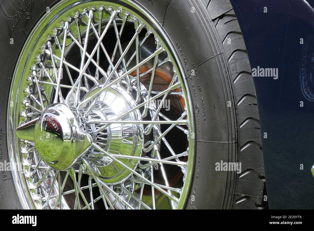 Wheel of black vintage classic luxury car close up Stock Photo - Alamy