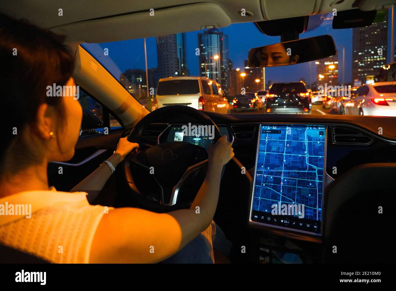 The rush hour traffic jam young woman Stock Photo - Alamy