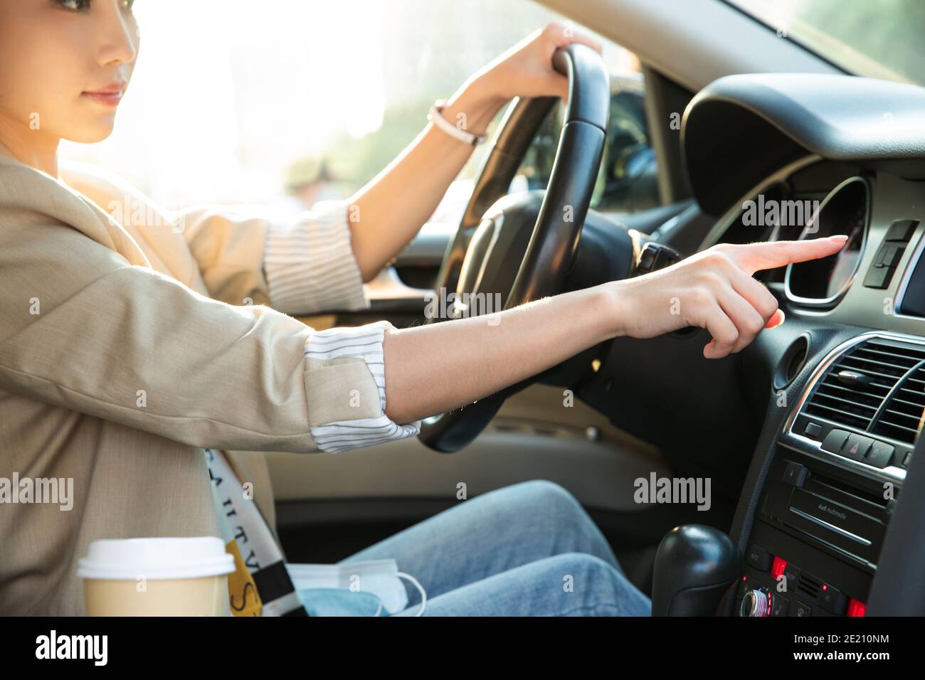 The young woman driving Stock Photo - Alamy