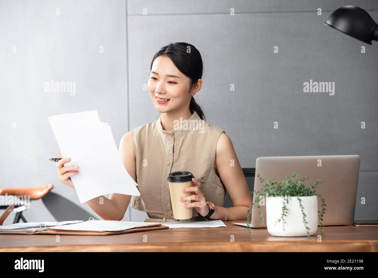 Ms business people looking documents hi-res stock photography and ...