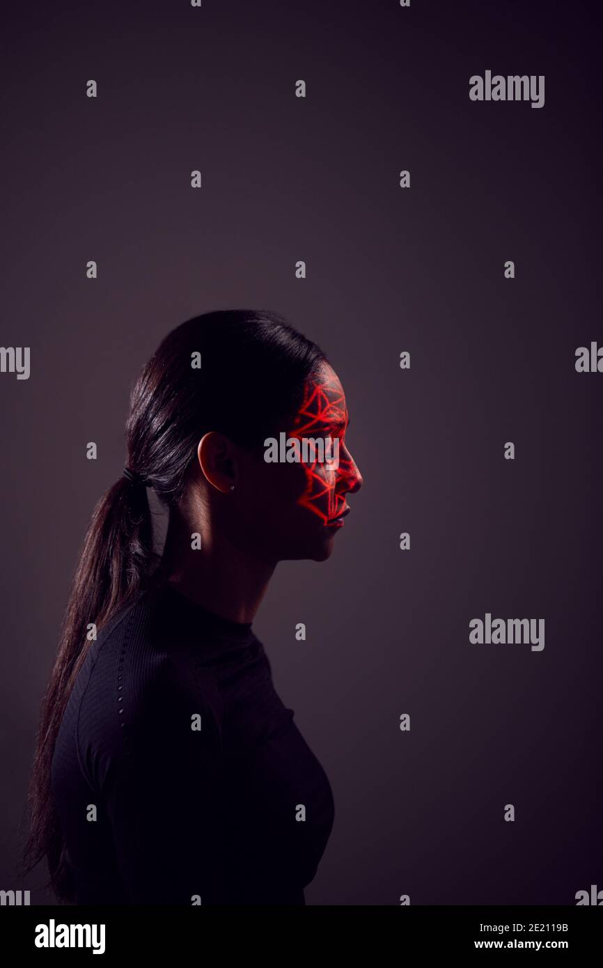 Facial Recognition Technology Concept As Woman Has Red Grid Projected ...