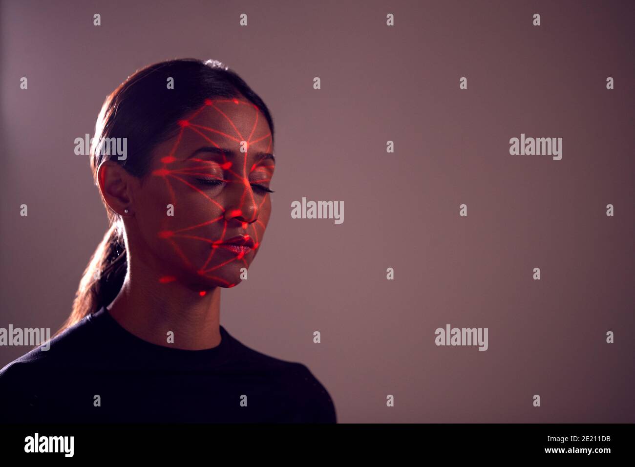 Facial Recognition Technology Concept As Woman Has Red Grid Projected ...