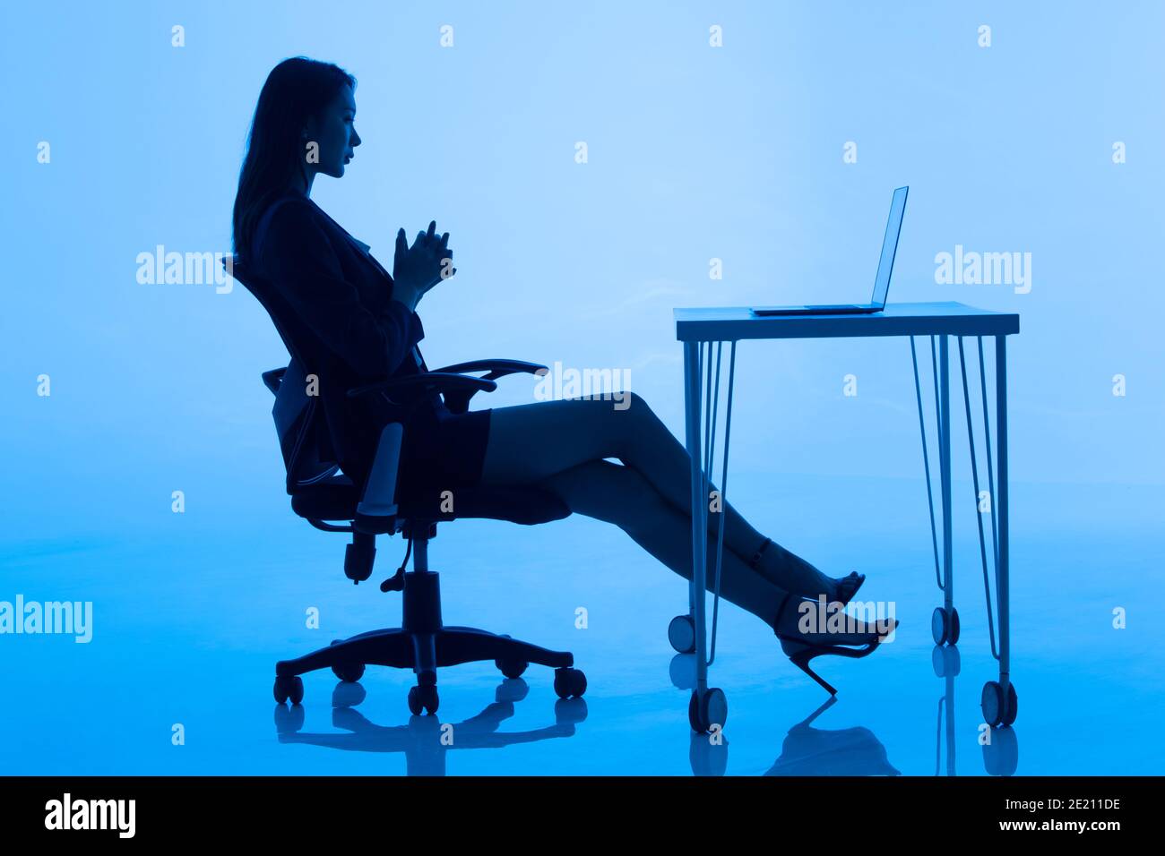 Busy business lady in the office Stock Photo - Alamy