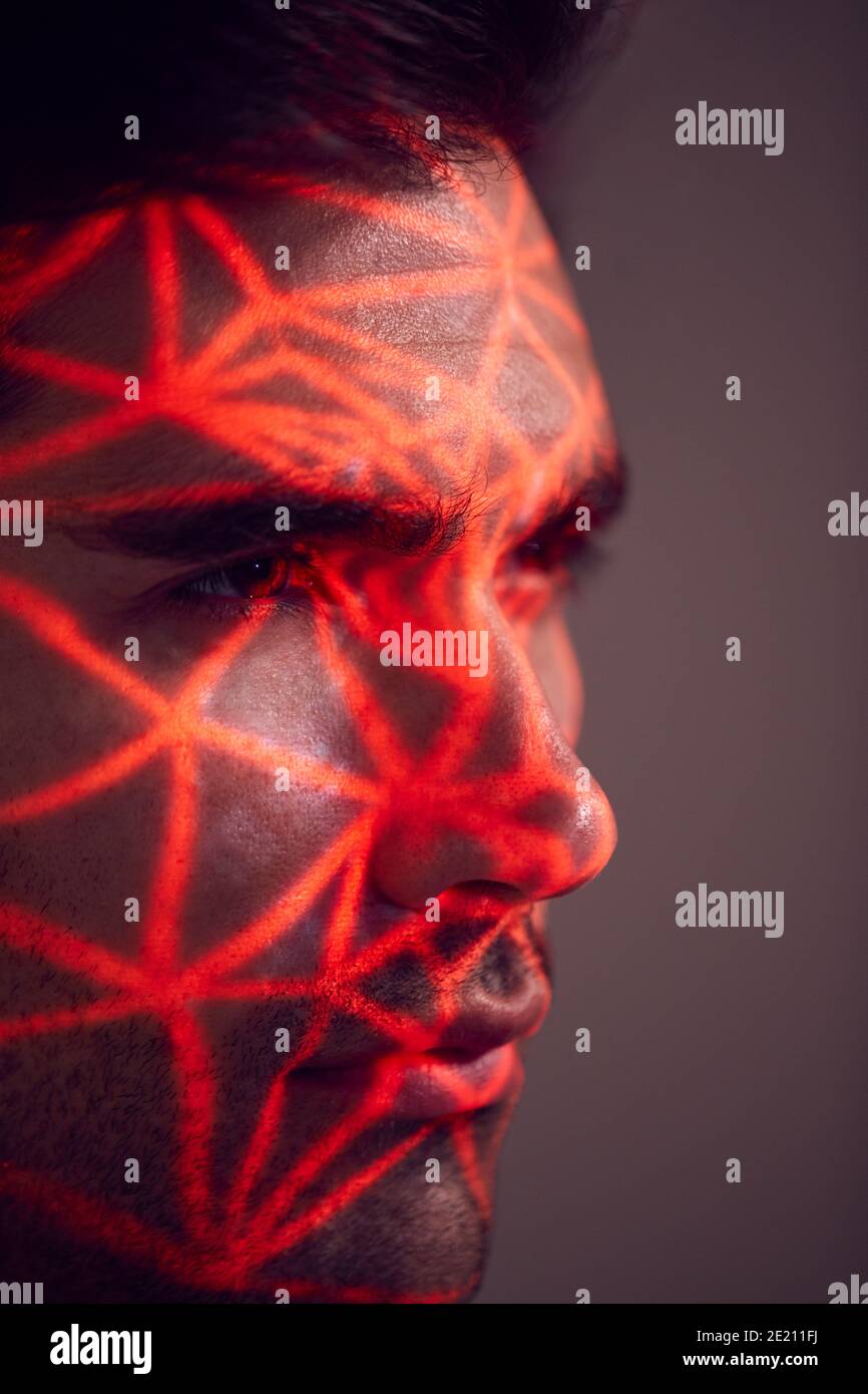 Facial Recognition Technology Concept As Man Has Red Grid Projected ...