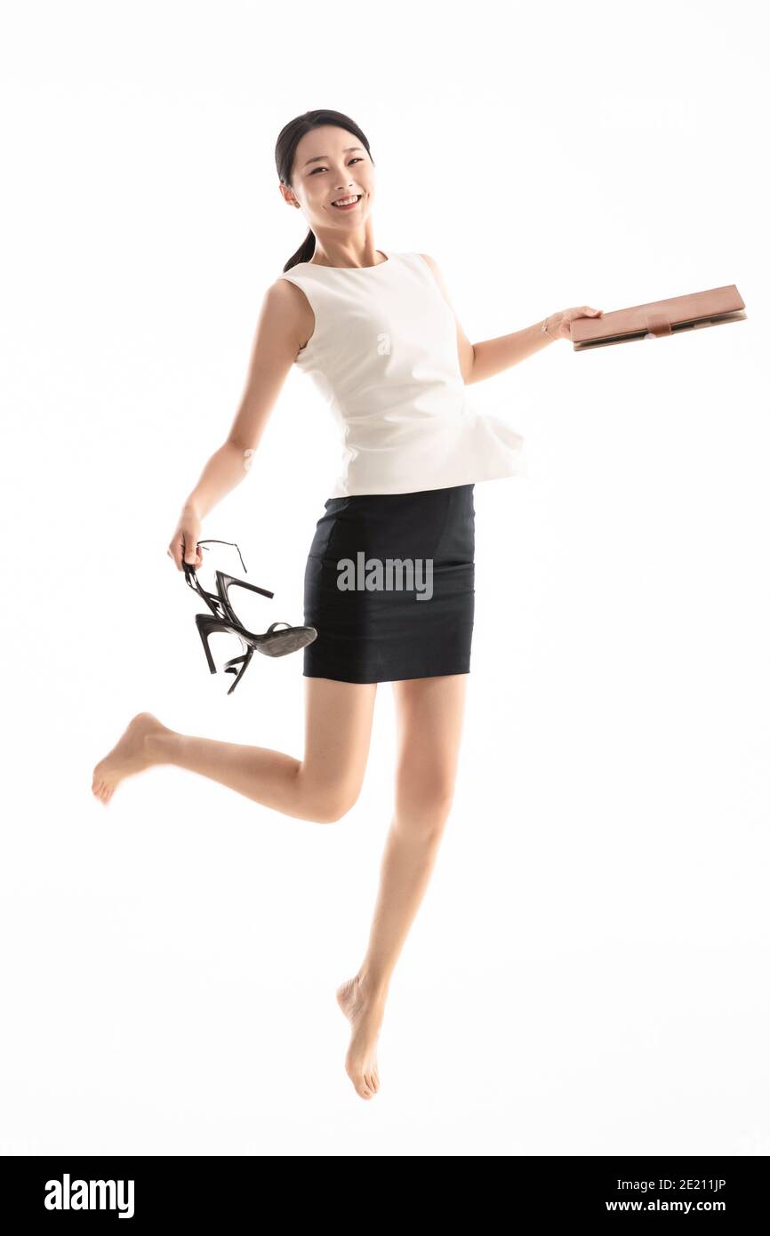 Asian businesswoman jumping hi-res stock photography and images - Alamy