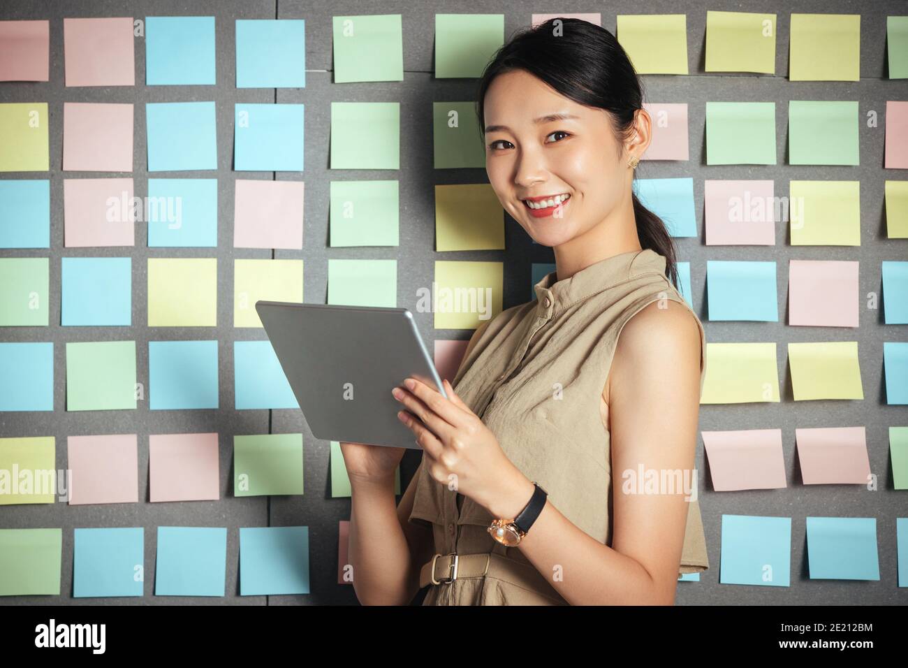 Using the tablet young women Stock Photo - Alamy