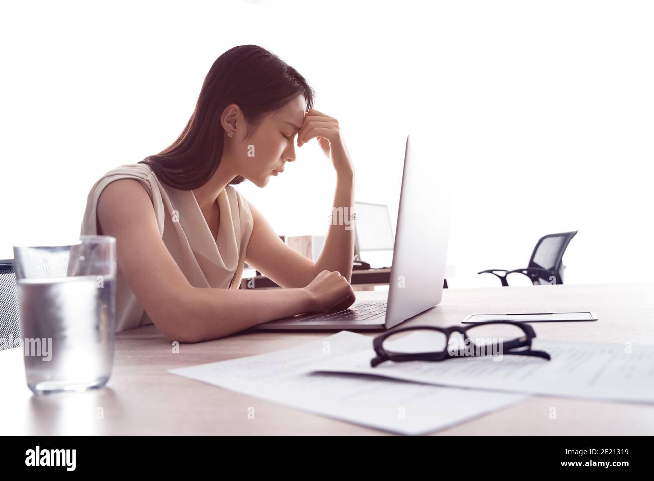 Work tired business lady Stock Photo - Alamy
