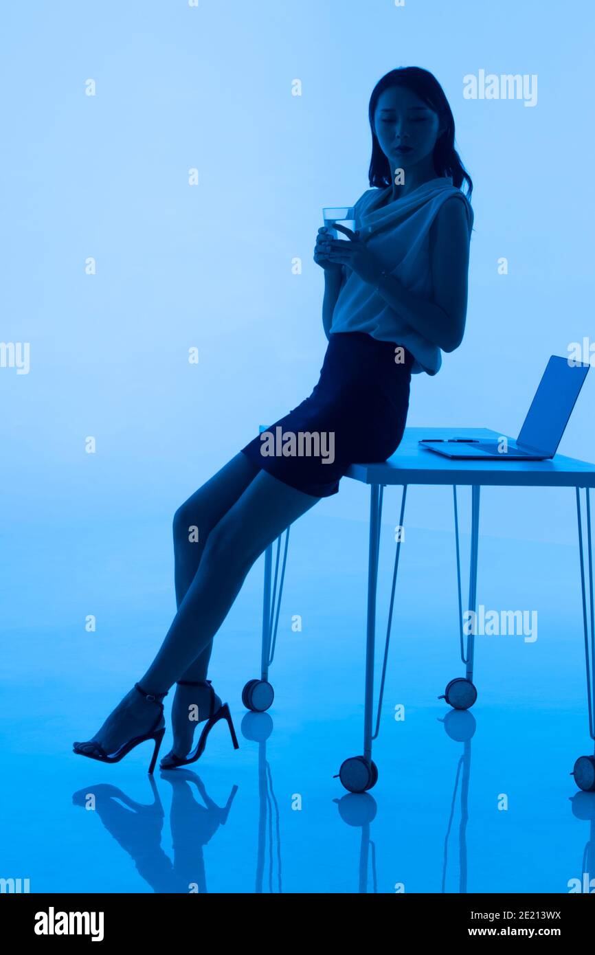 Business lady in the office of water Stock Photo - Alamy
